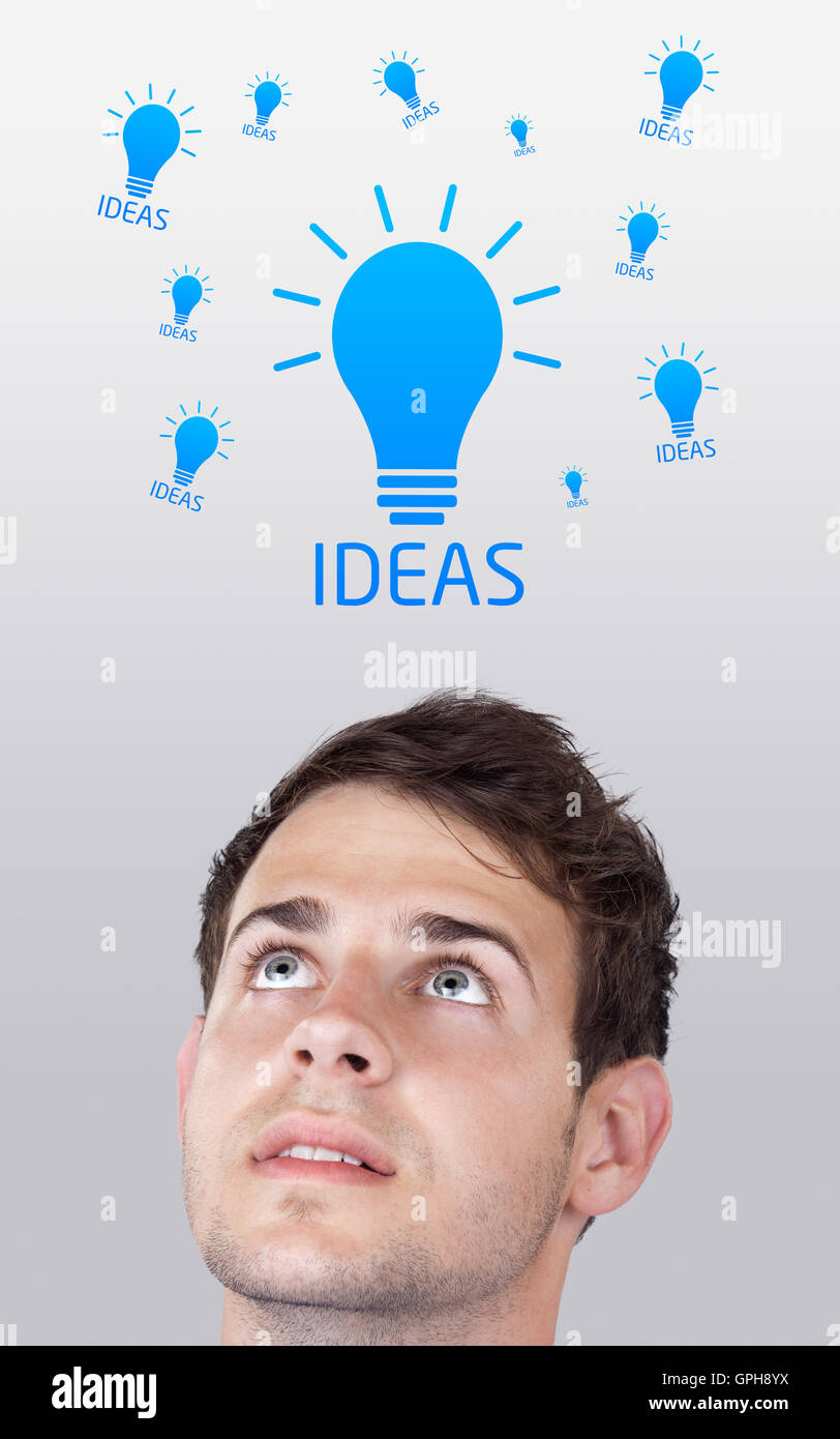 Young person looking at idea type of sign Stock Photo - Alamy