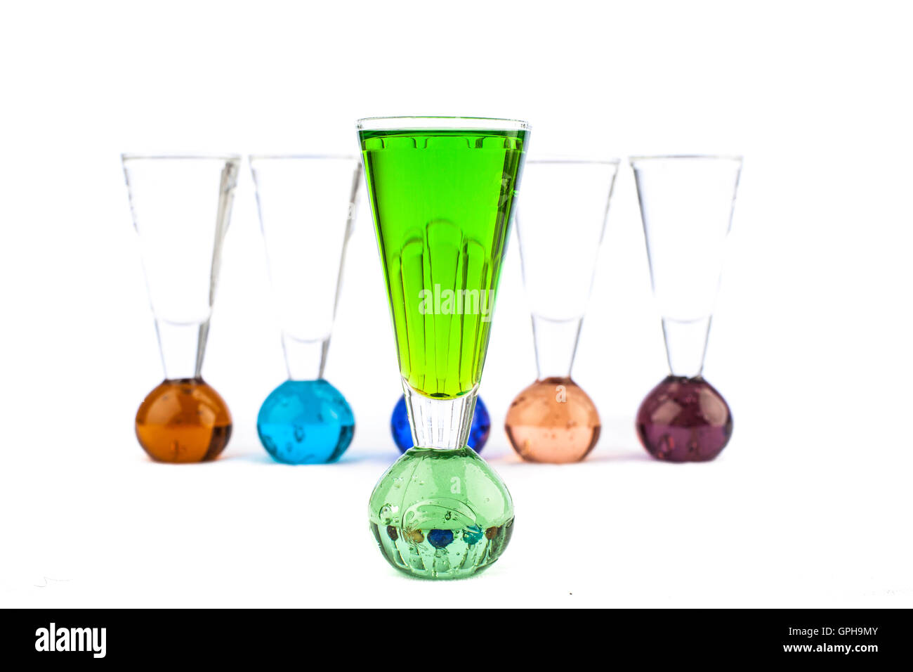 Shot Glasses with colored shot in front Stock Photo - Alamy