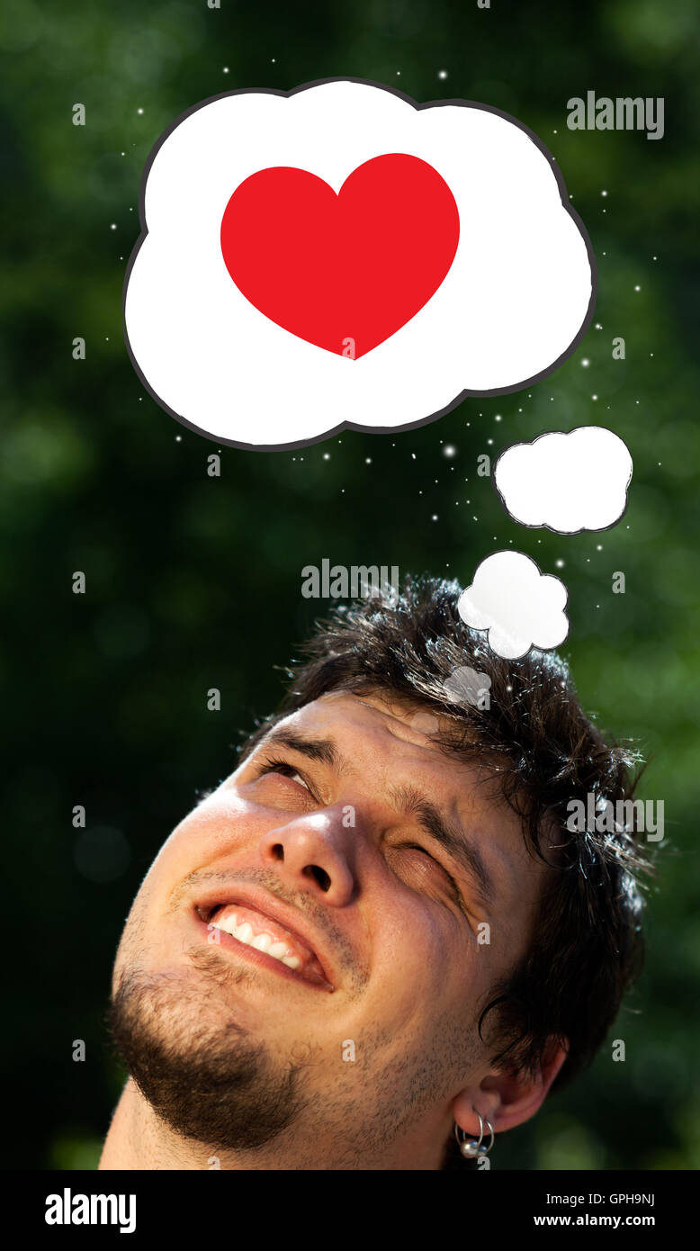 Young head looking at love type of icons Stock Photo - Alamy