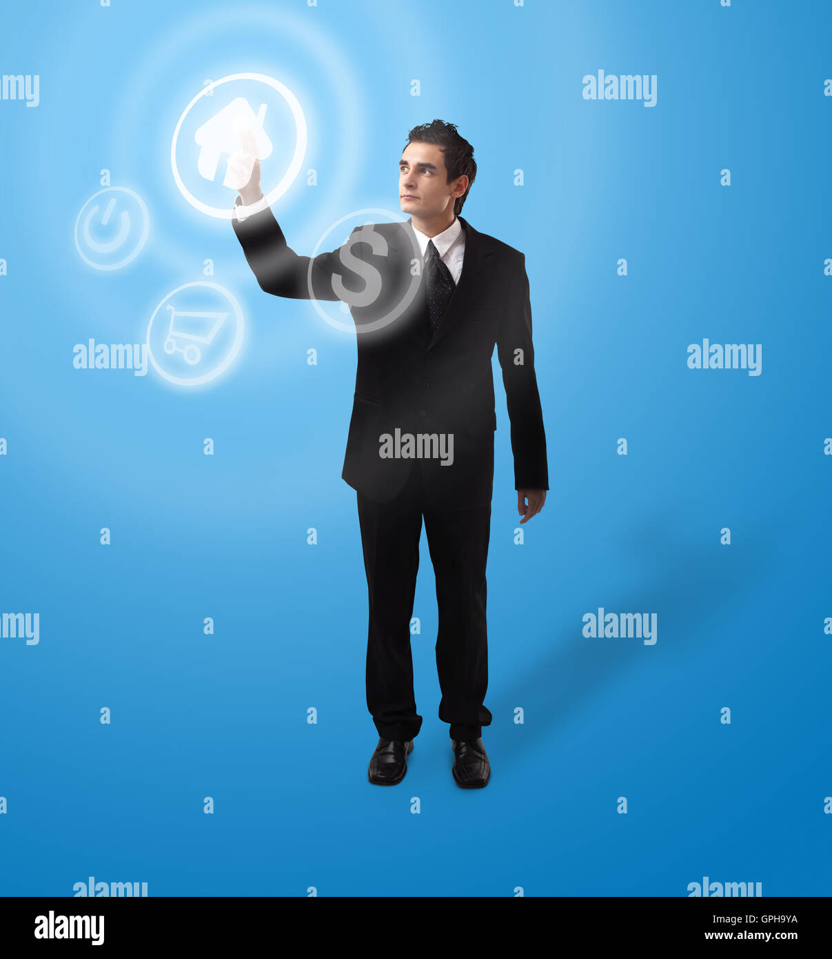 Business man pressing button Stock Photo - Alamy