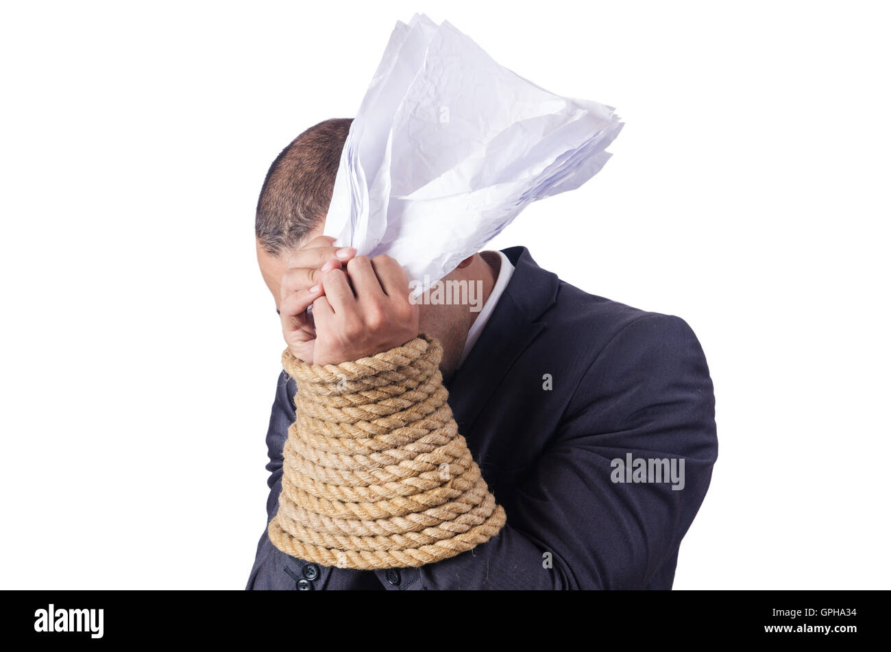 Businessman tied up with rope Stock Photo - Alamy