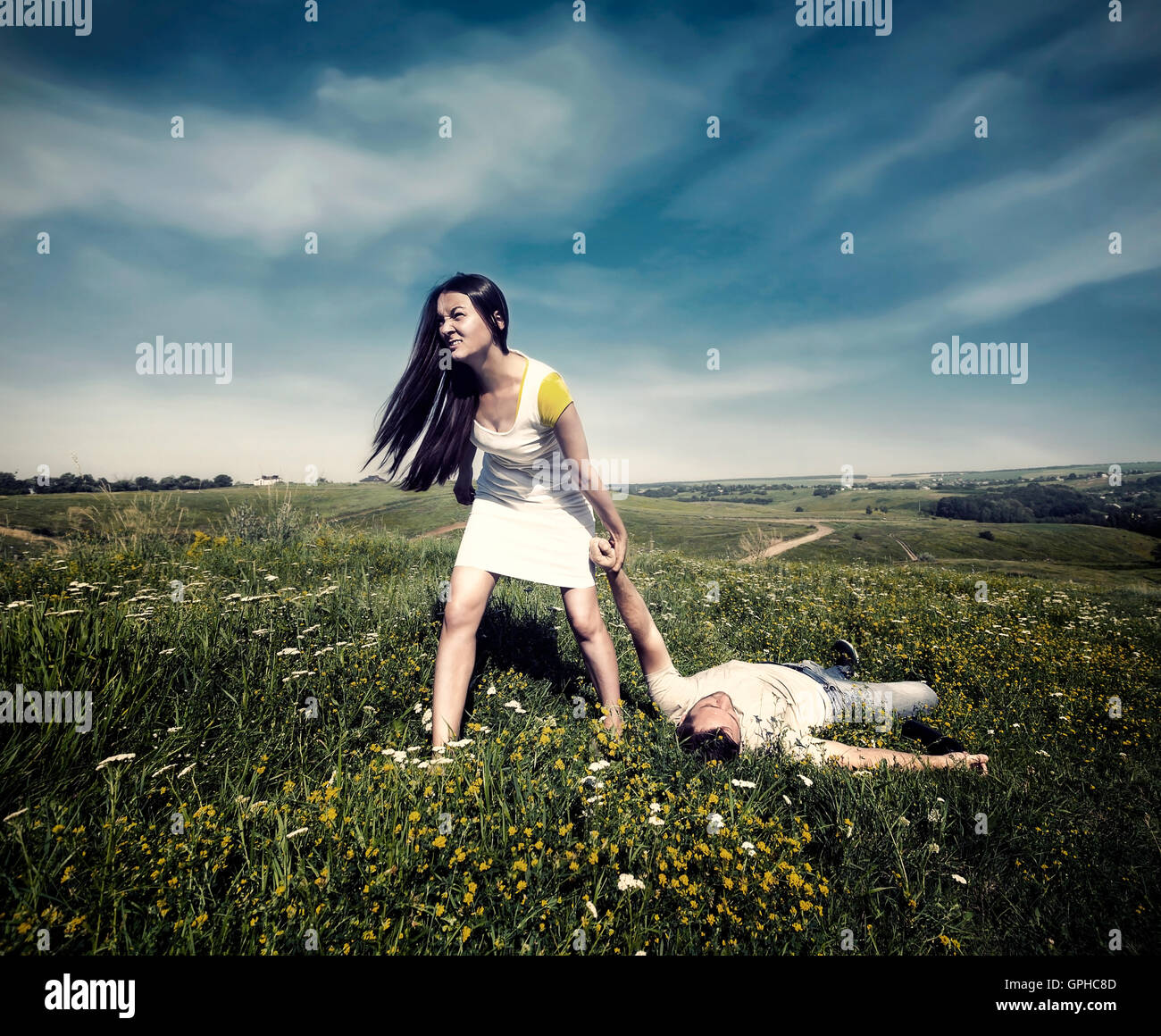 Woman pulling a slapped man Stock Photo - Alamy