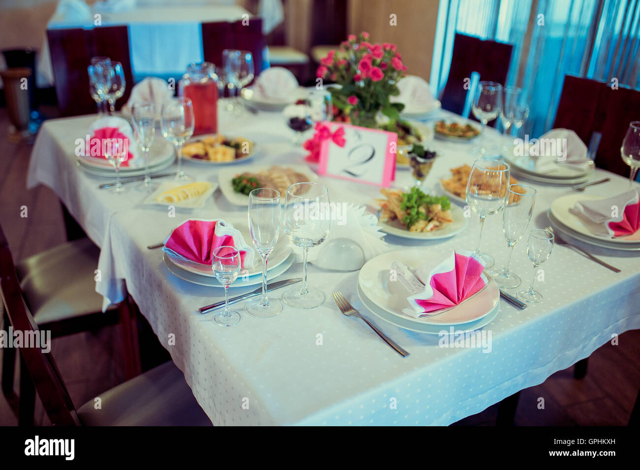 Good served table with food and drink in a restaurant Stock Photo - Alamy