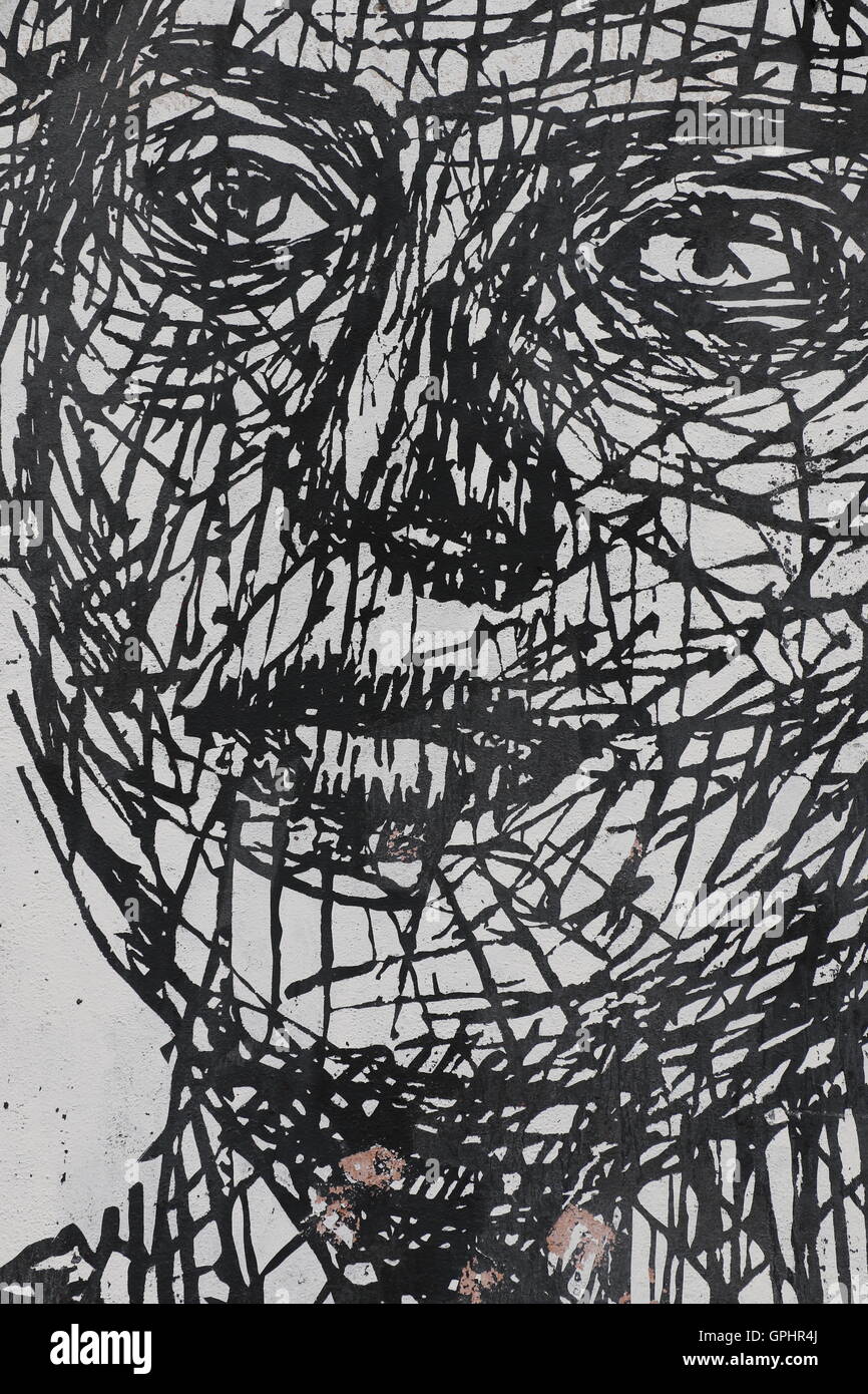 Street Art in Rome representing a face Stock Photo - Alamy