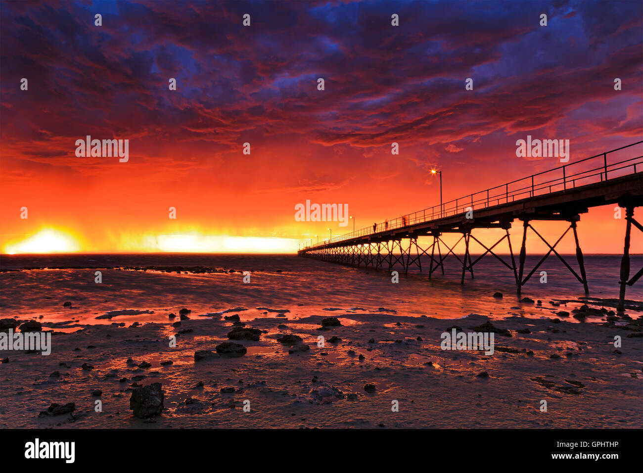 REd stormy sunset over horizon at Ceduna bay on Great Australian Bight ...