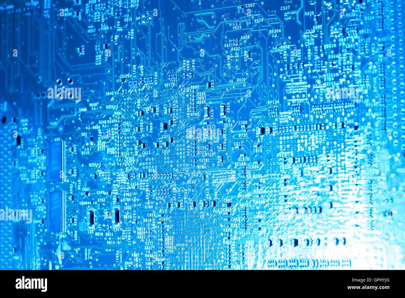 full frame blue illuminated printed circuit board closeup Stock Photo ...