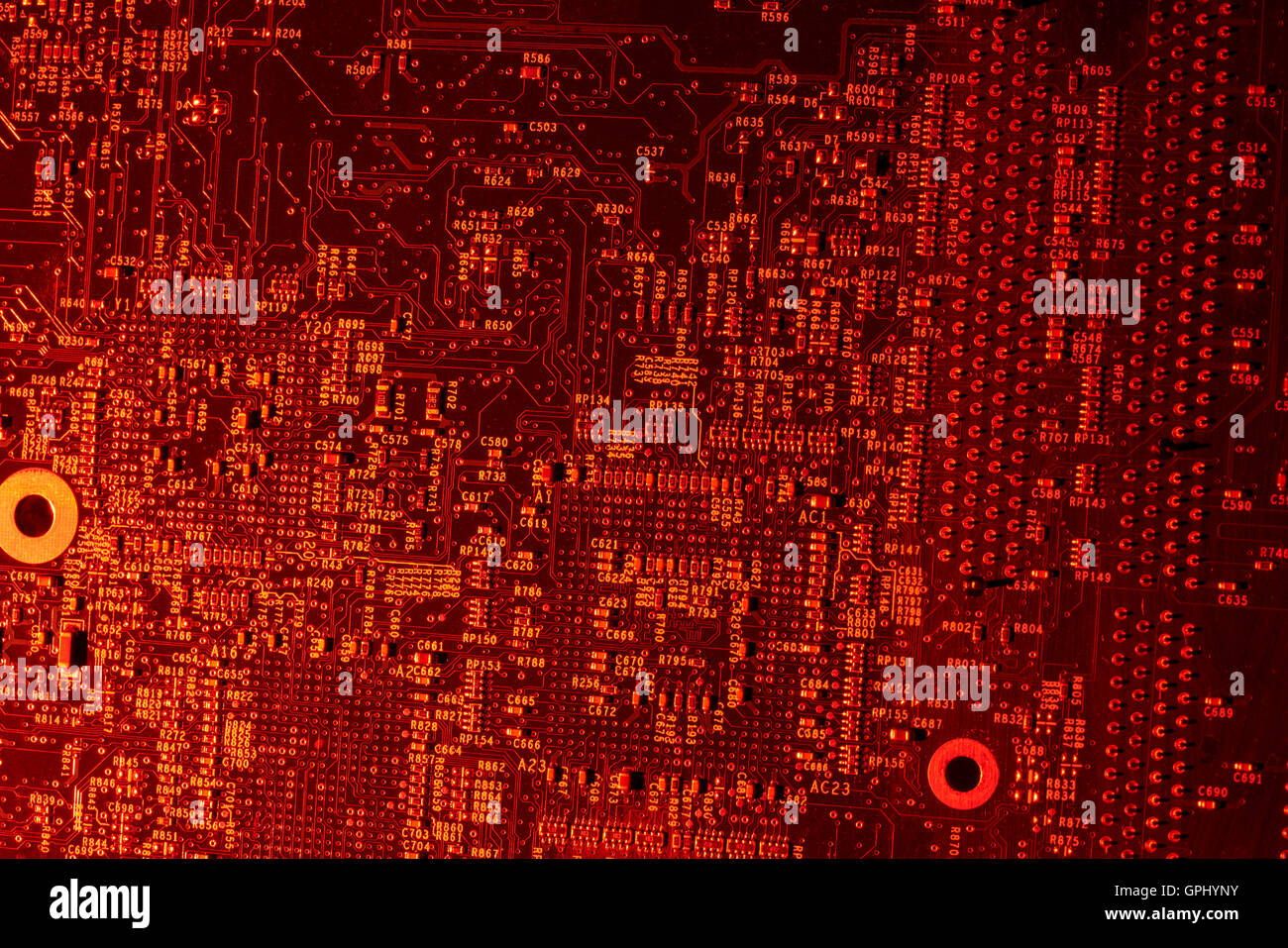 full frame red illuminated printed circuit board closeup Stock Photo ...