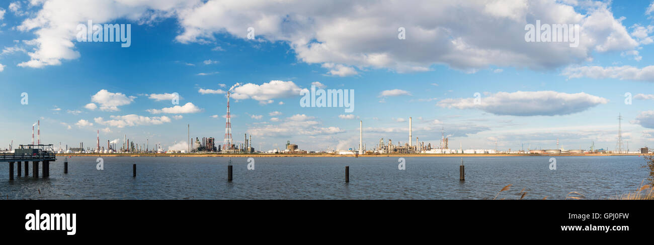 Panorama of a large industrial area with tall flare stacks in the port ...
