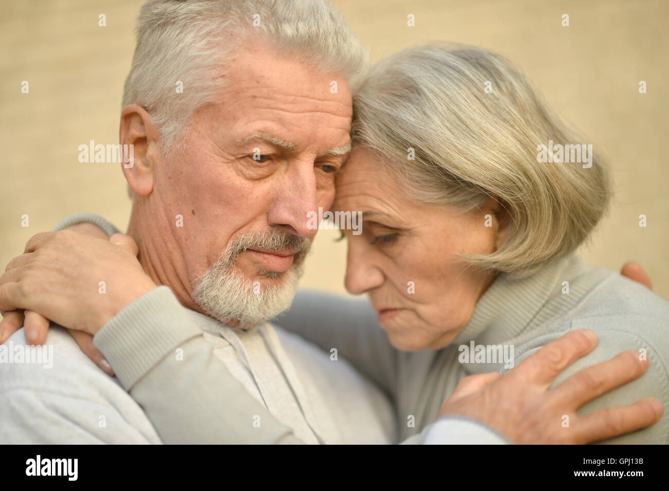 Sad senior couple Stock Photo - Alamy