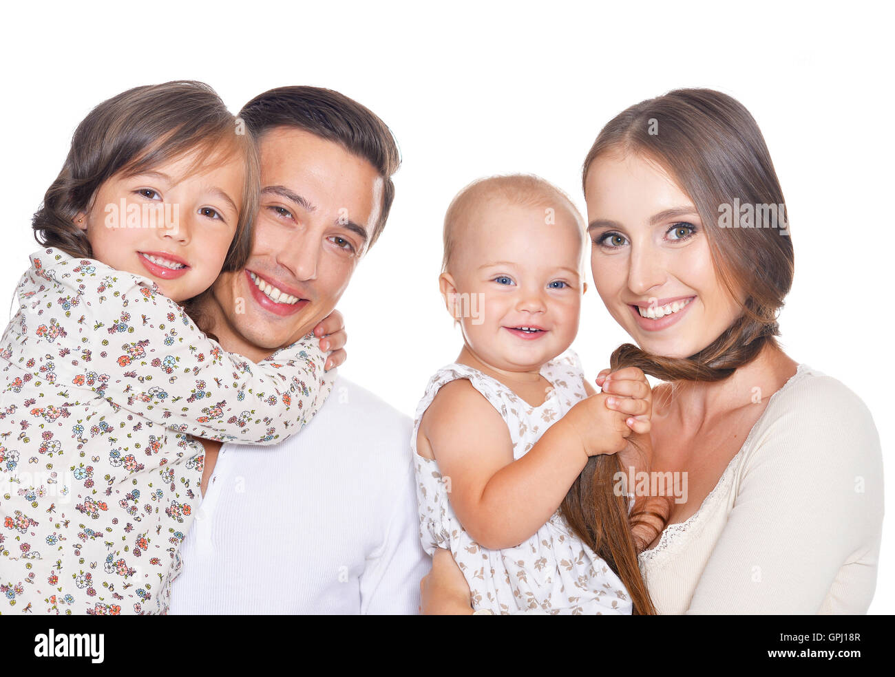 Happy family of four on white Stock Photo - Alamy
