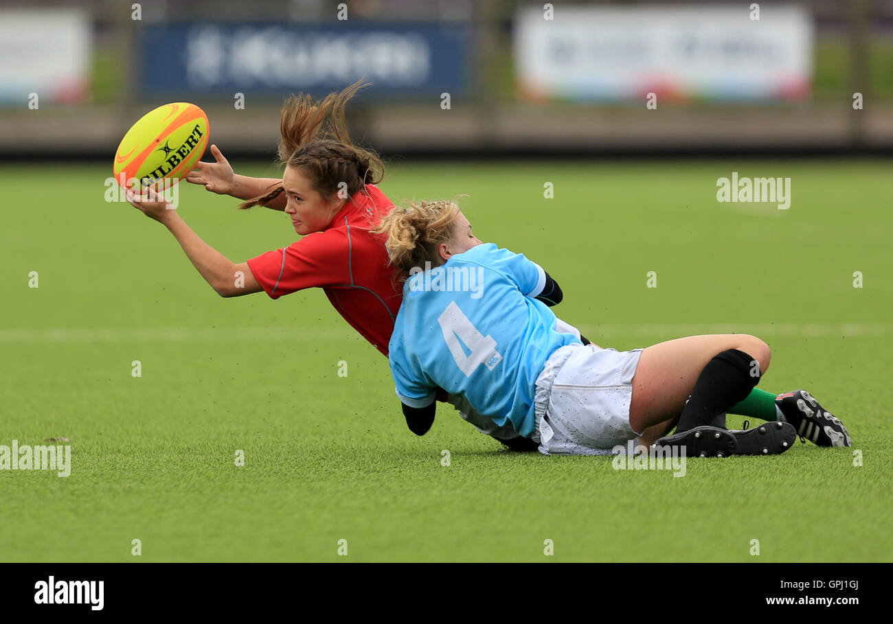 Wales East's Caitlin Lewis is tackled in the Rugby 7s Bowl final during ...