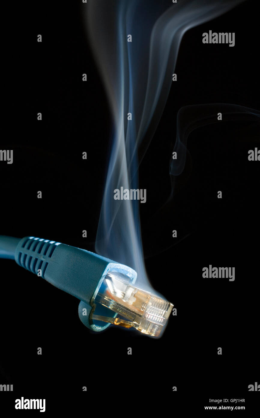 Network connection for a computer that is smoking on a black background ...