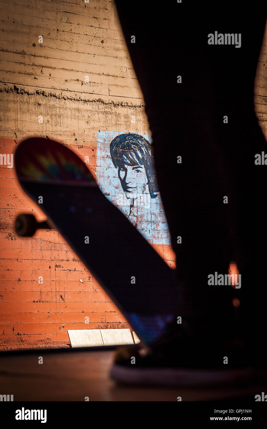 PHOENIX, AZ - FEB 20: Skateboarders wait their turn on the mini-ramp at ...