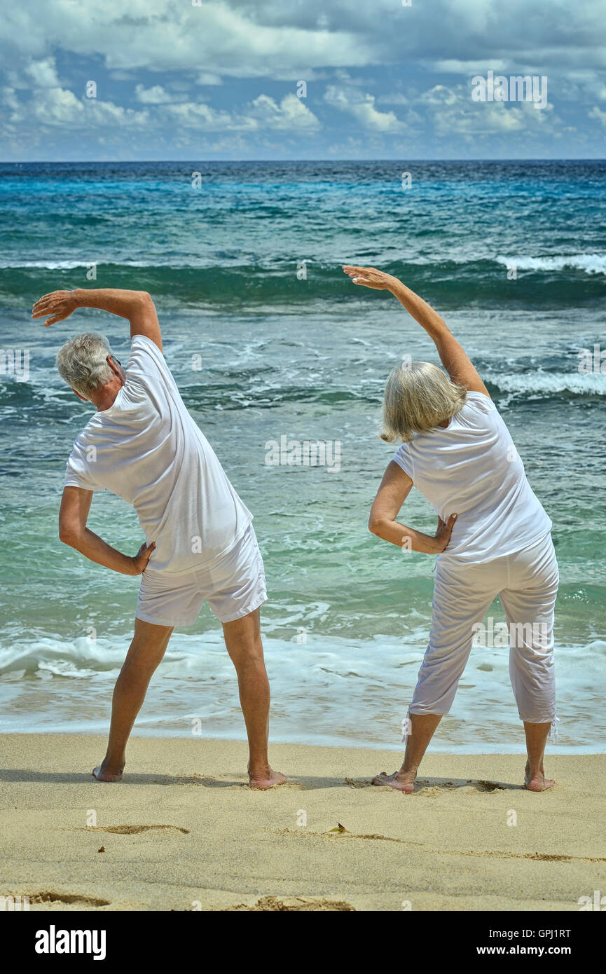 Senior couple exercising in summer Stock Photo - Alamy