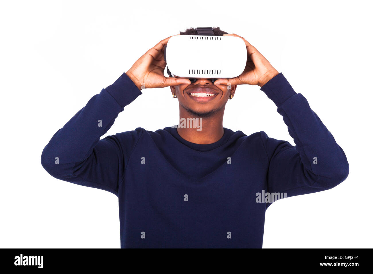 African American young man wearing vr virtual reality headset over ...