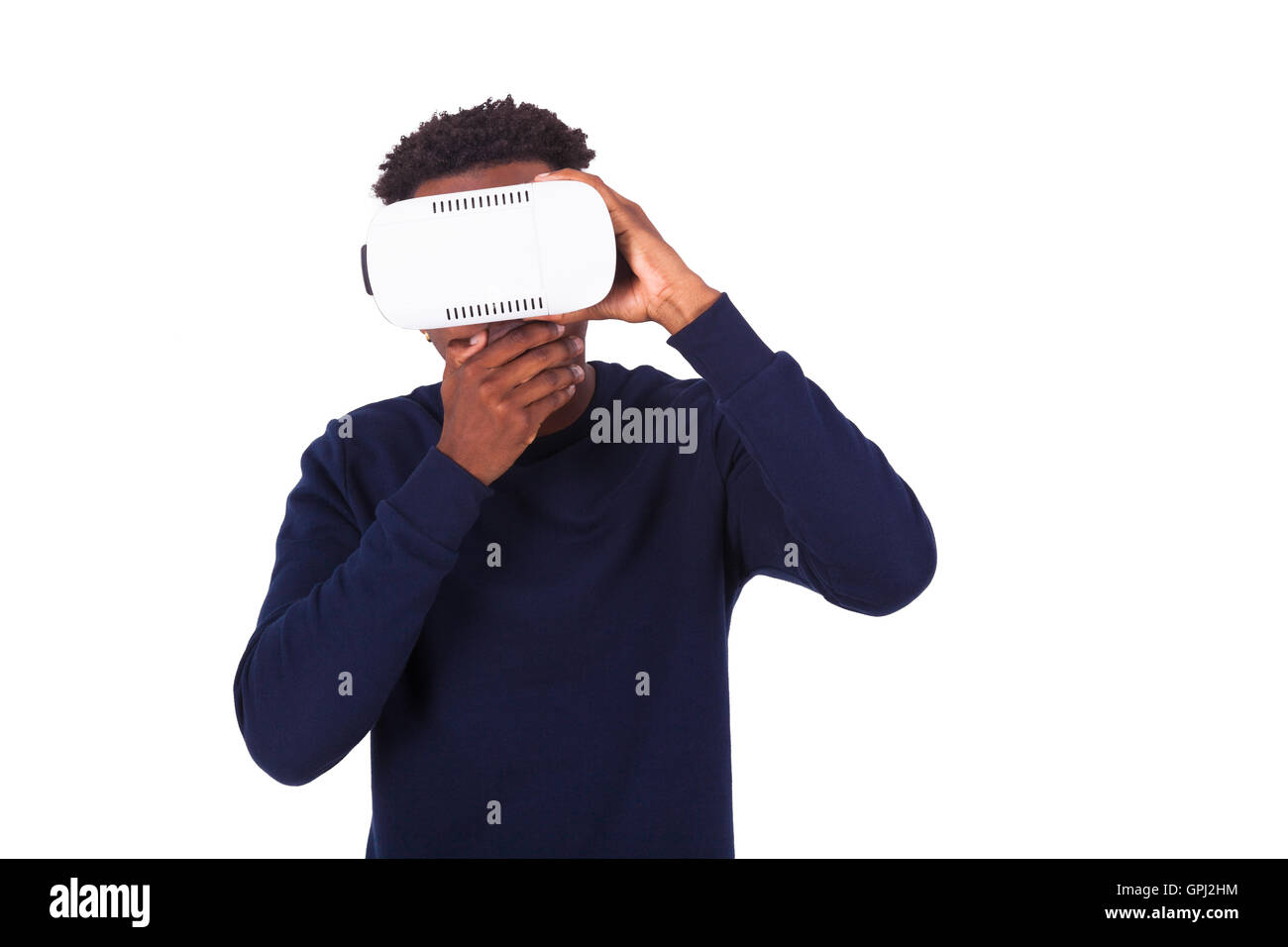 African American young man wearing vr virtual reality headset over ...