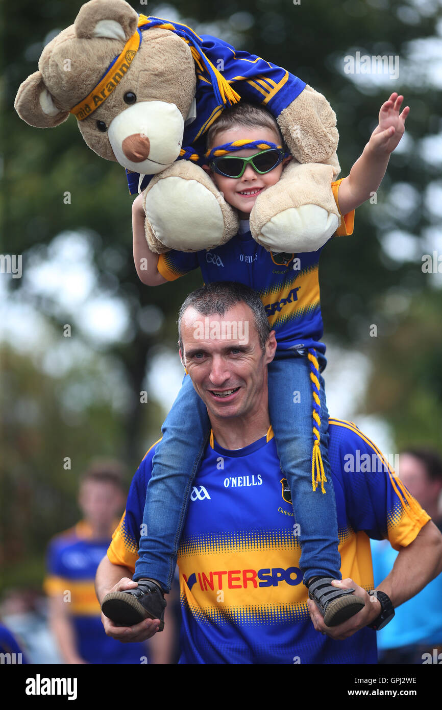 Tipperary fans John Russell and his son Callum, 5, make their way to ...