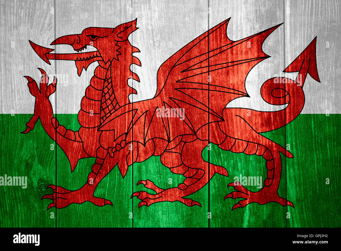 flag of Wales or Welsh banner on wooden background Stock Photo - Alamy