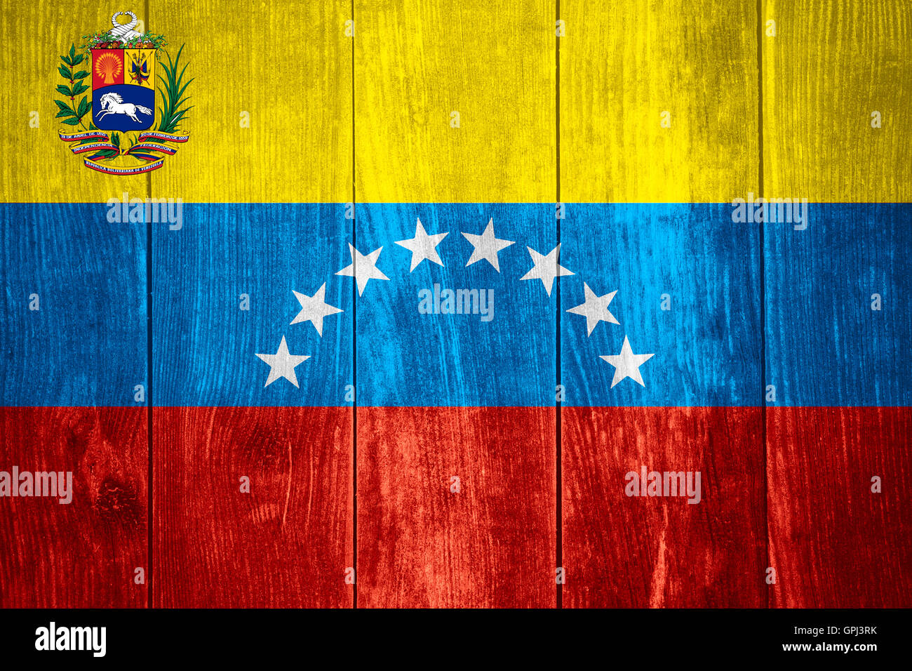 flag of Venezuela or Venezuelan banner on wooden background Stock Photo ...