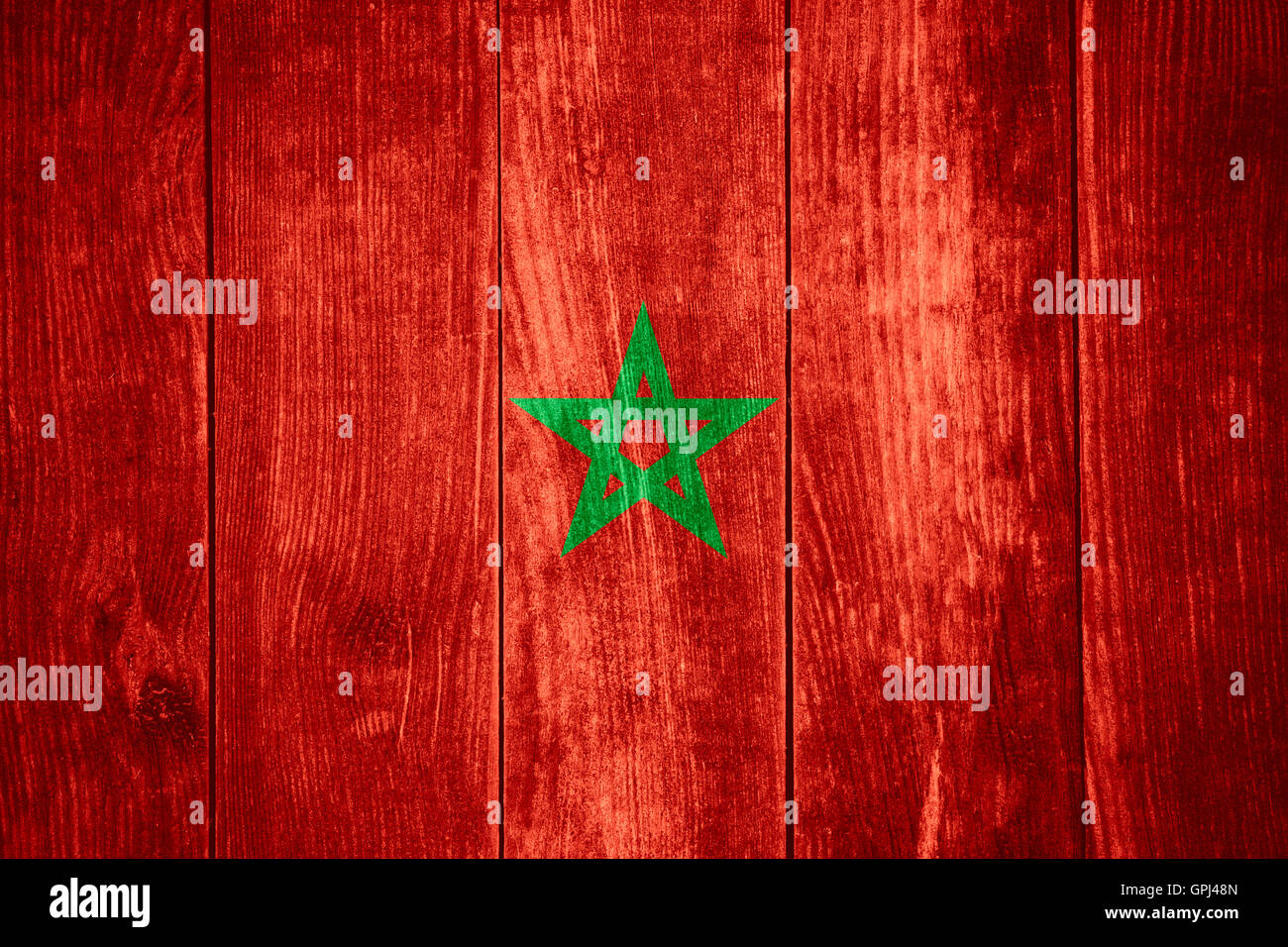 flag of Morocco or Moroccan banner on wooden background Stock Photo - Alamy