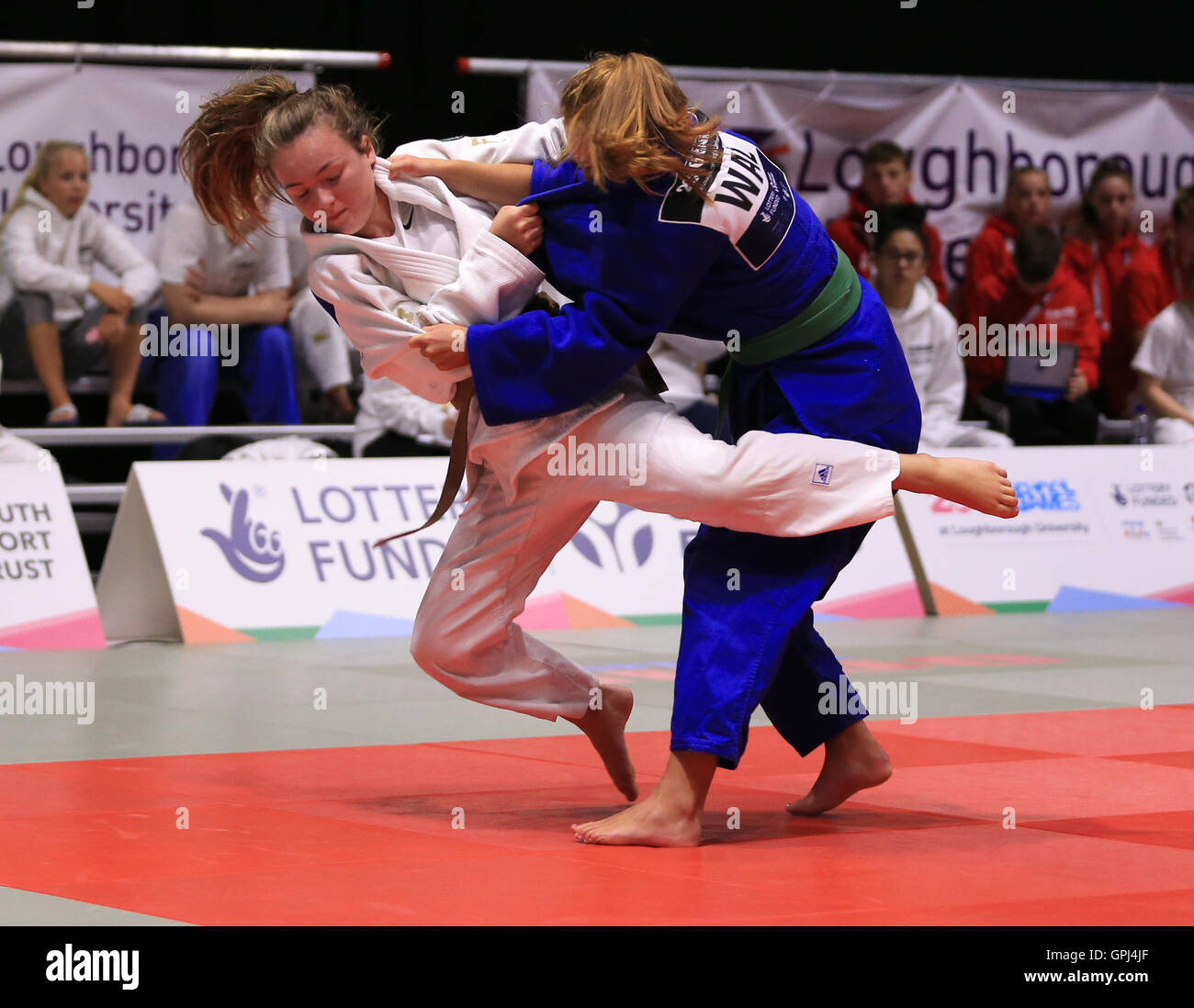 General view of action between England (white) and Wales (blue) in the ...