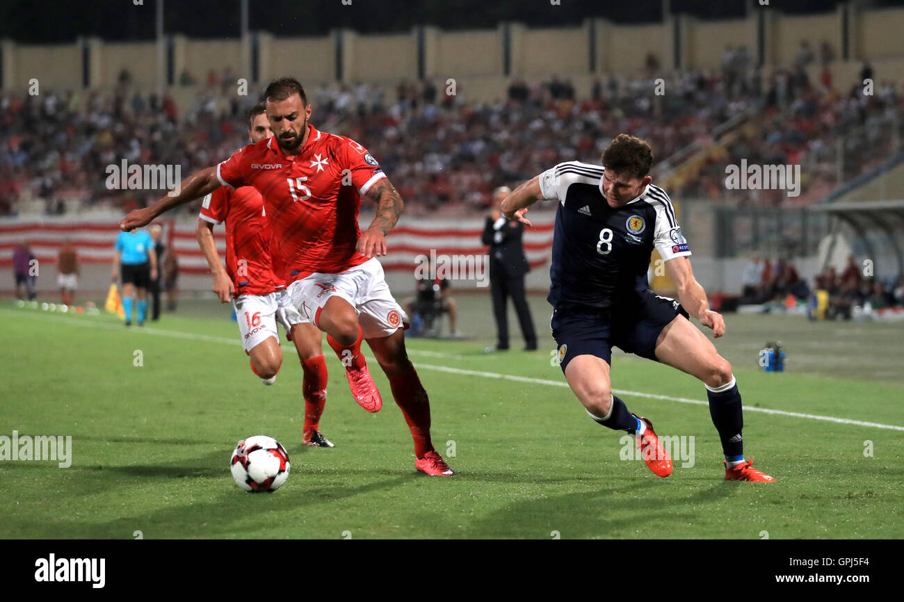 Malta's Steve Borg (left) and Scotland's Oliver Burke (right) battle ...