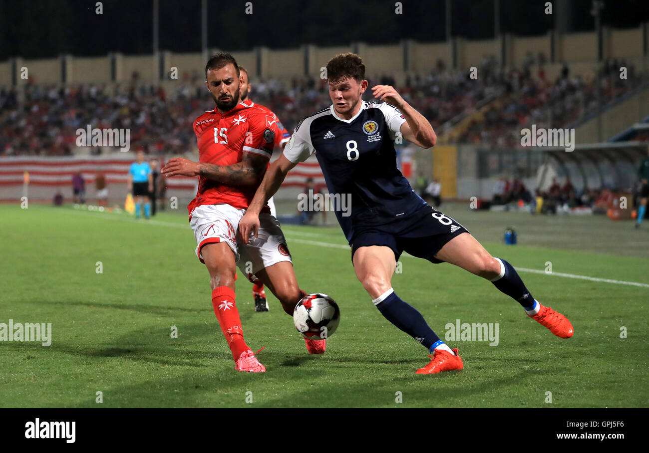 Malta's Steve Borg (left) and Scotland's Oliver Burke (right) battle ...
