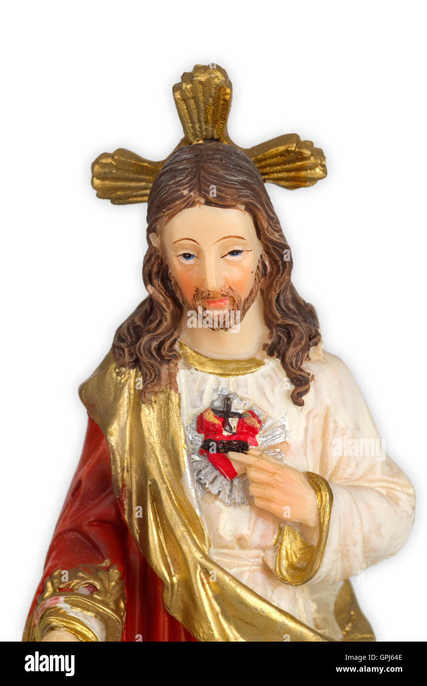 Jesus figurine isolated on white background Stock Photo - Alamy