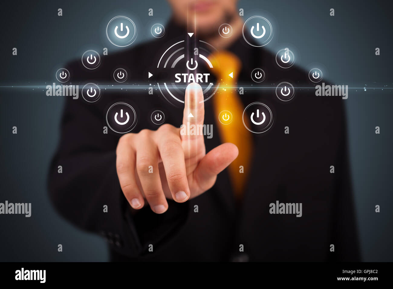 Businessman pressing simple type of start buttons Stock Photo - Alamy