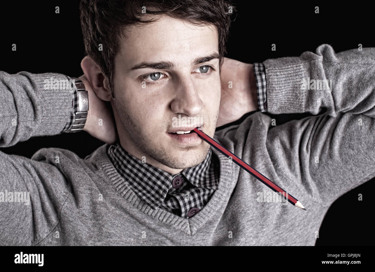young man with pencil Stock Photo - Alamy