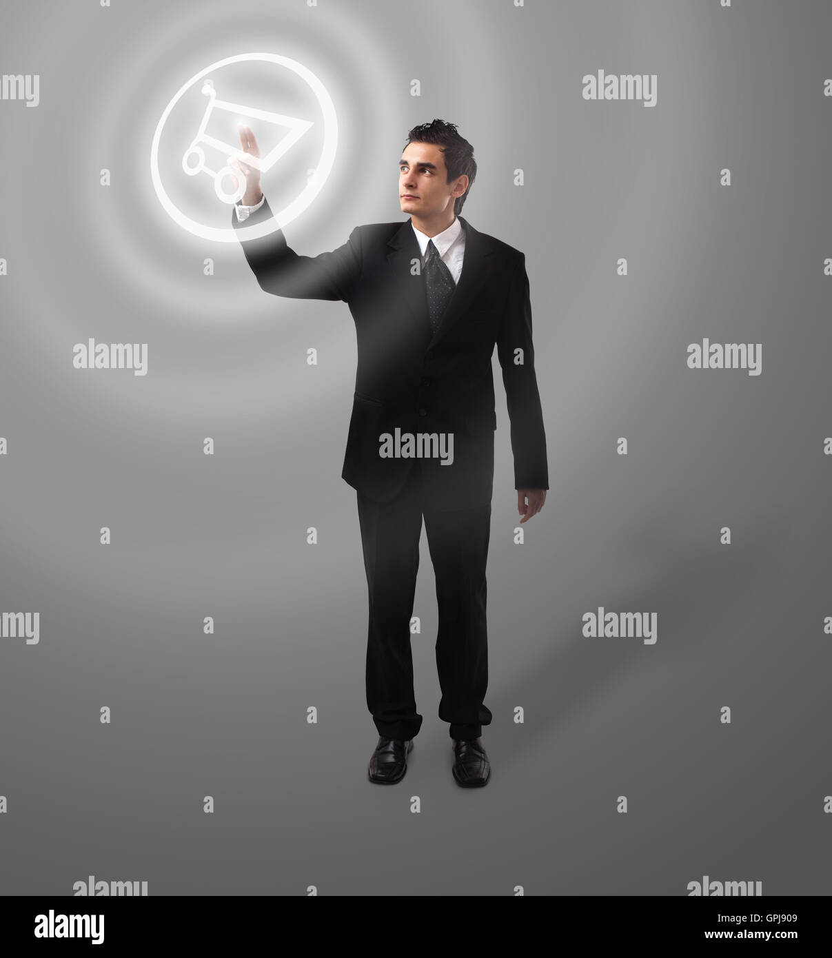 Business man pressing button Stock Photo - Alamy