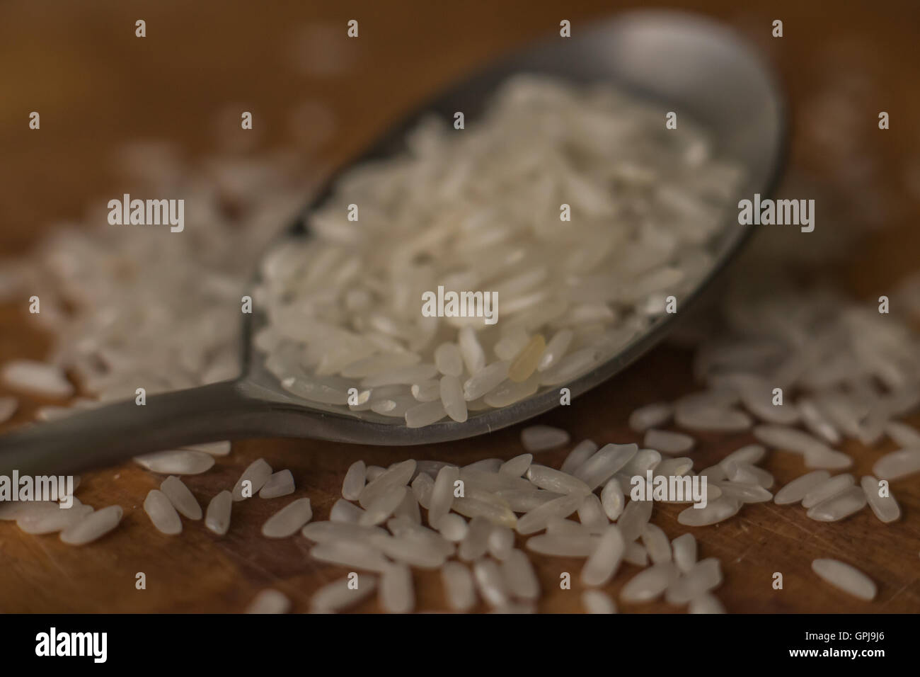 spoons of rice Stock Photo - Alamy