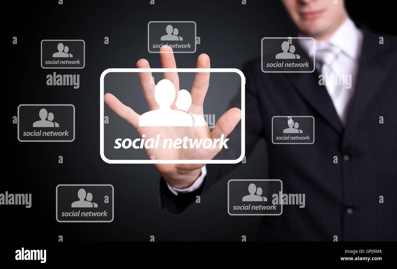 man hand pressing Social network sign Stock Photo - Alamy