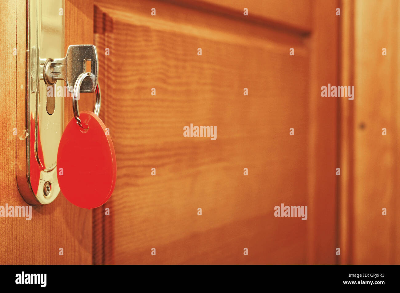 door handle with inserted key in the keyhole Stock Photo - Alamy