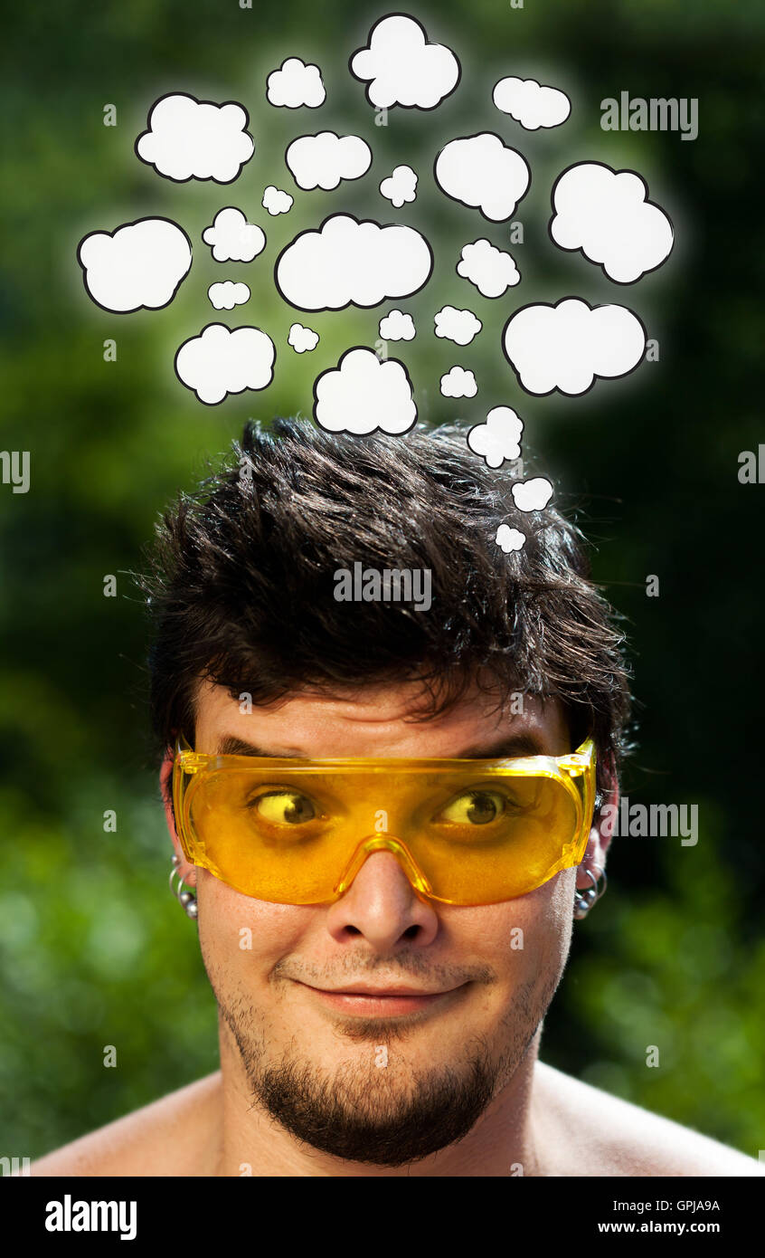 Young head thinking with clouds Stock Photo - Alamy