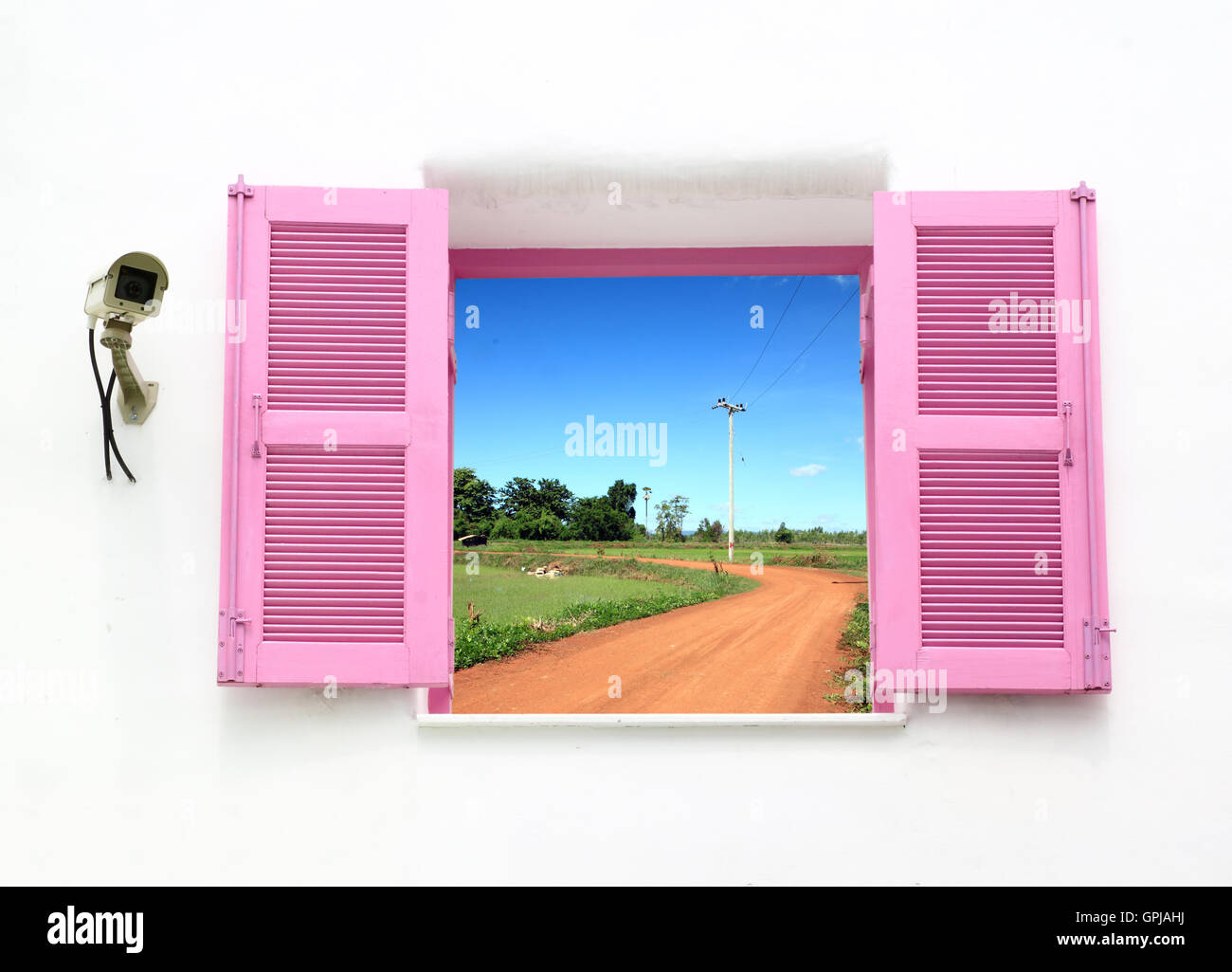 Greek style windows with cctv and soil curve road Stock Photo - Alamy