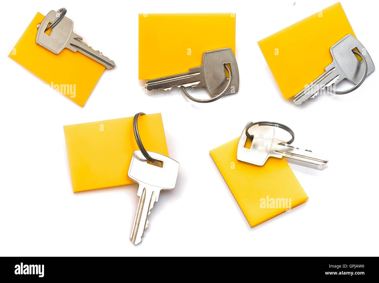 collection keys with a blank tag on a white background Stock Photo - Alamy
