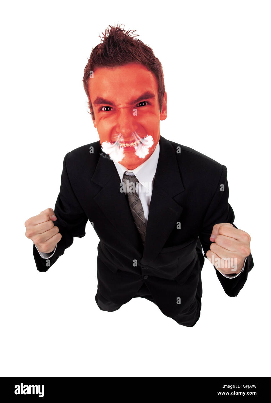 Angry business man with red exploding face Stock Photo - Alamy