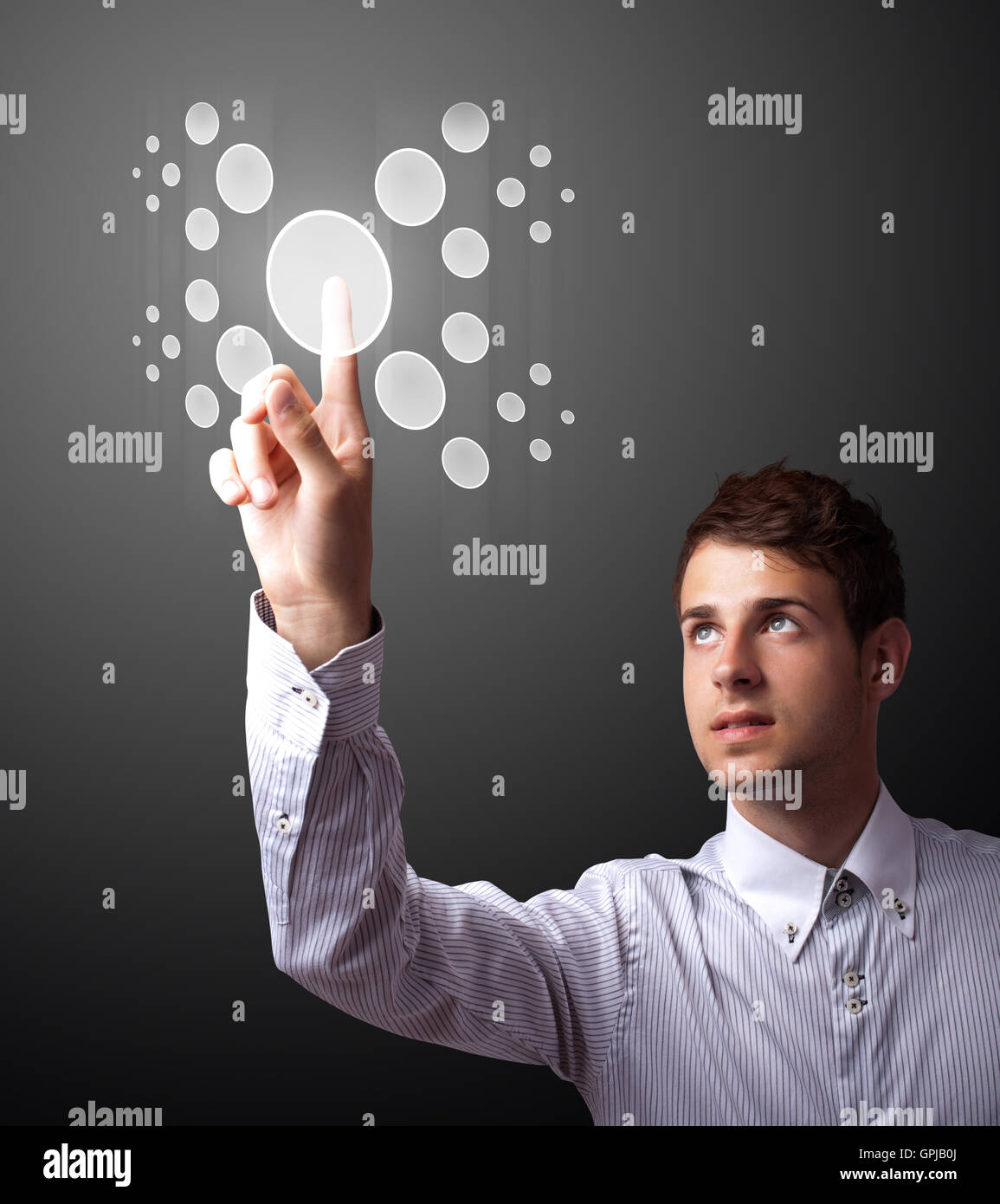 Businessman pressing high tech type of modern buttons Stock Photo - Alamy