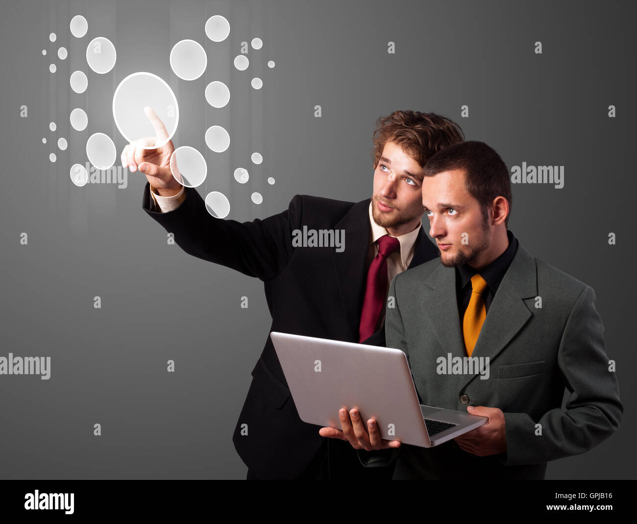 Businessman pressing high tech type of modern buttons Stock Photo - Alamy