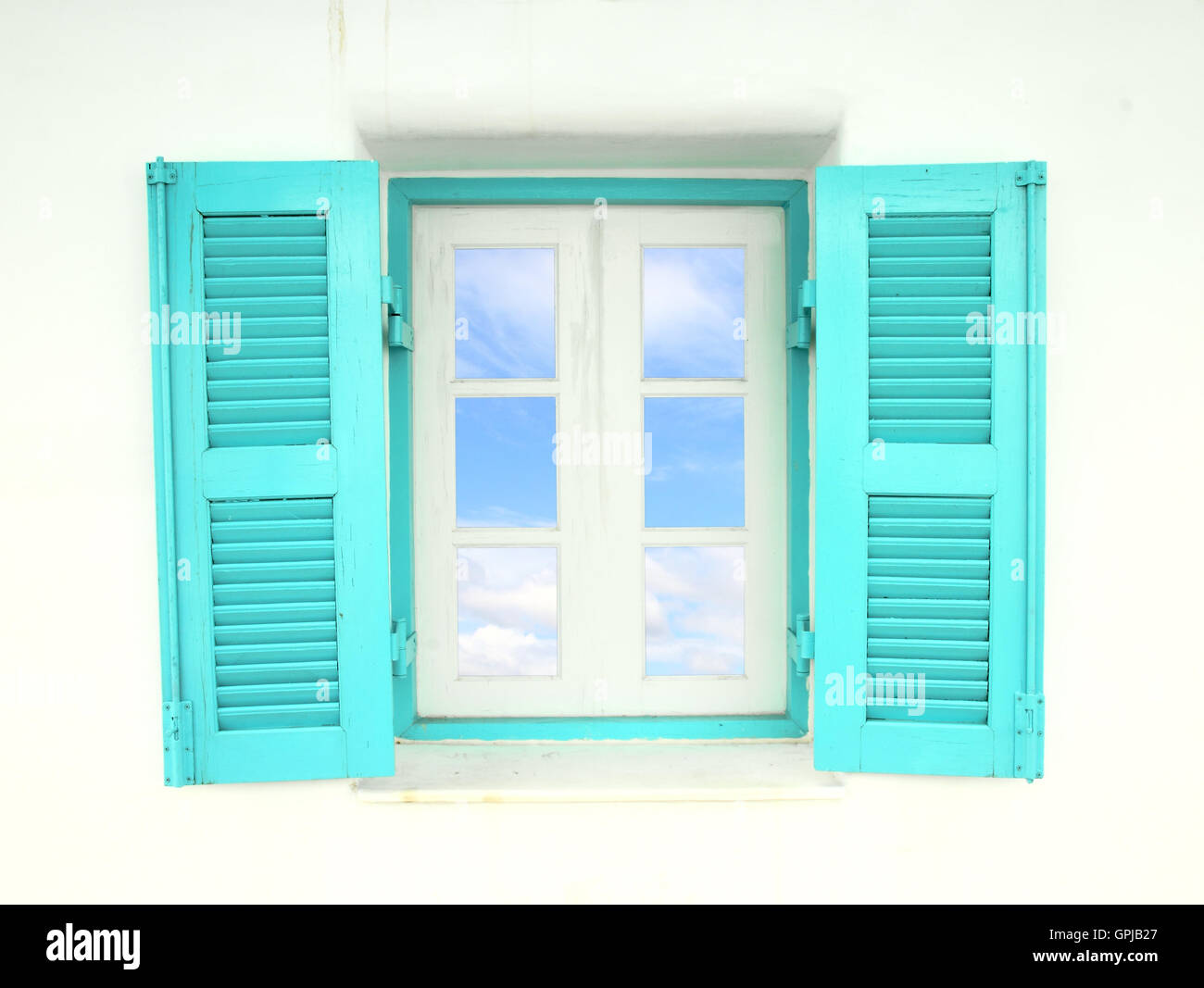 Greek style windows with blue sky Stock Photo - Alamy