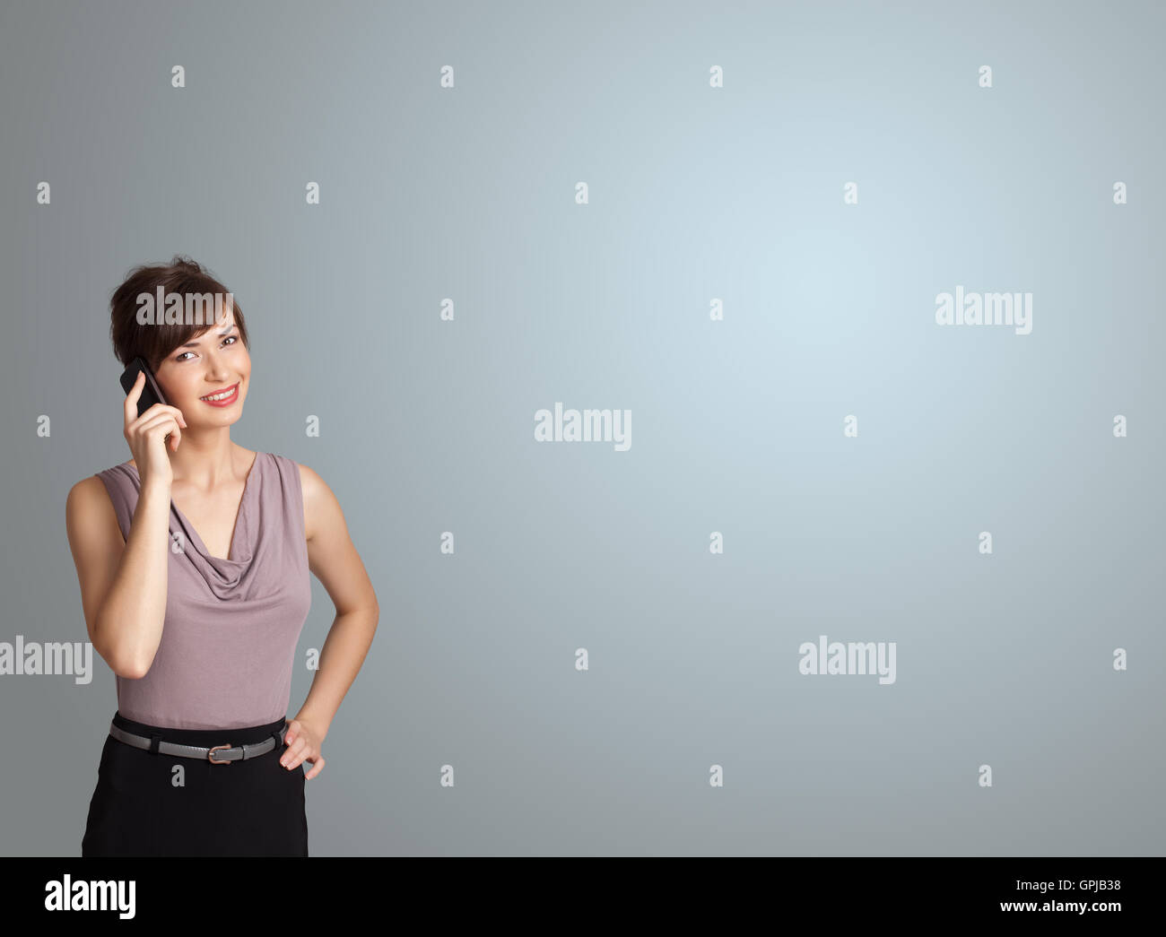 pretty woman making phone call with copy space Stock Photo - Alamy