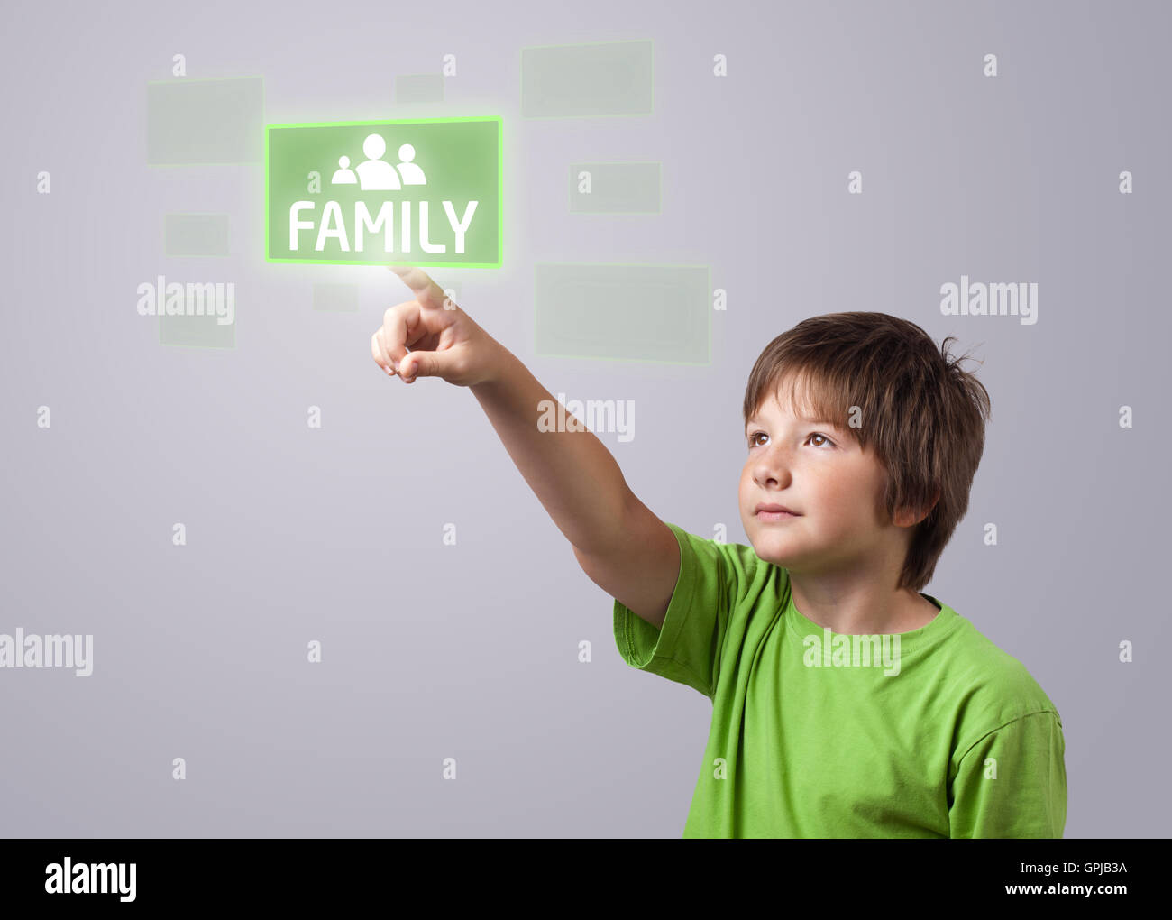 Kid touching FAMILY button Stock Photo - Alamy
