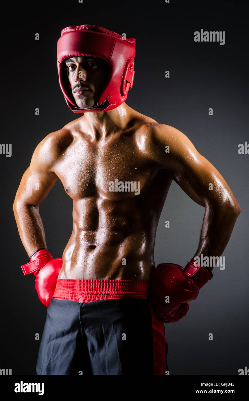 Muscular boxer in dark studio Stock Photo - Alamy