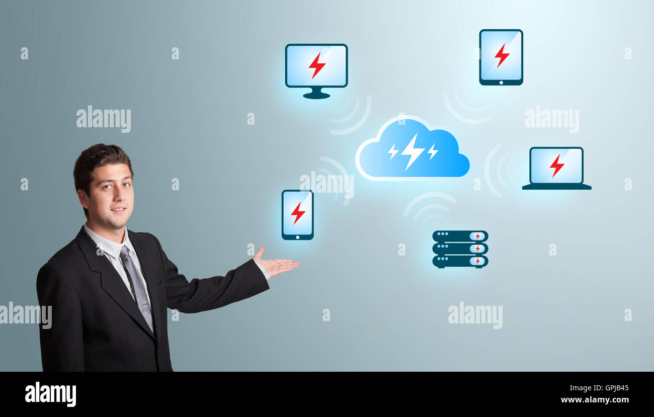 Young man presenting cloud computing network Stock Photo - Alamy