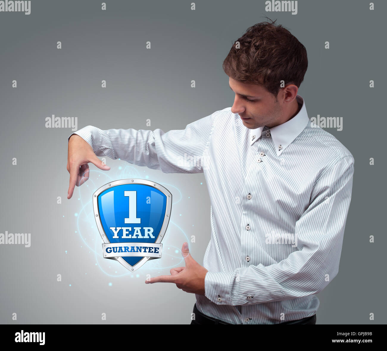 businessman holding virtual shield sign Stock Photo - Alamy