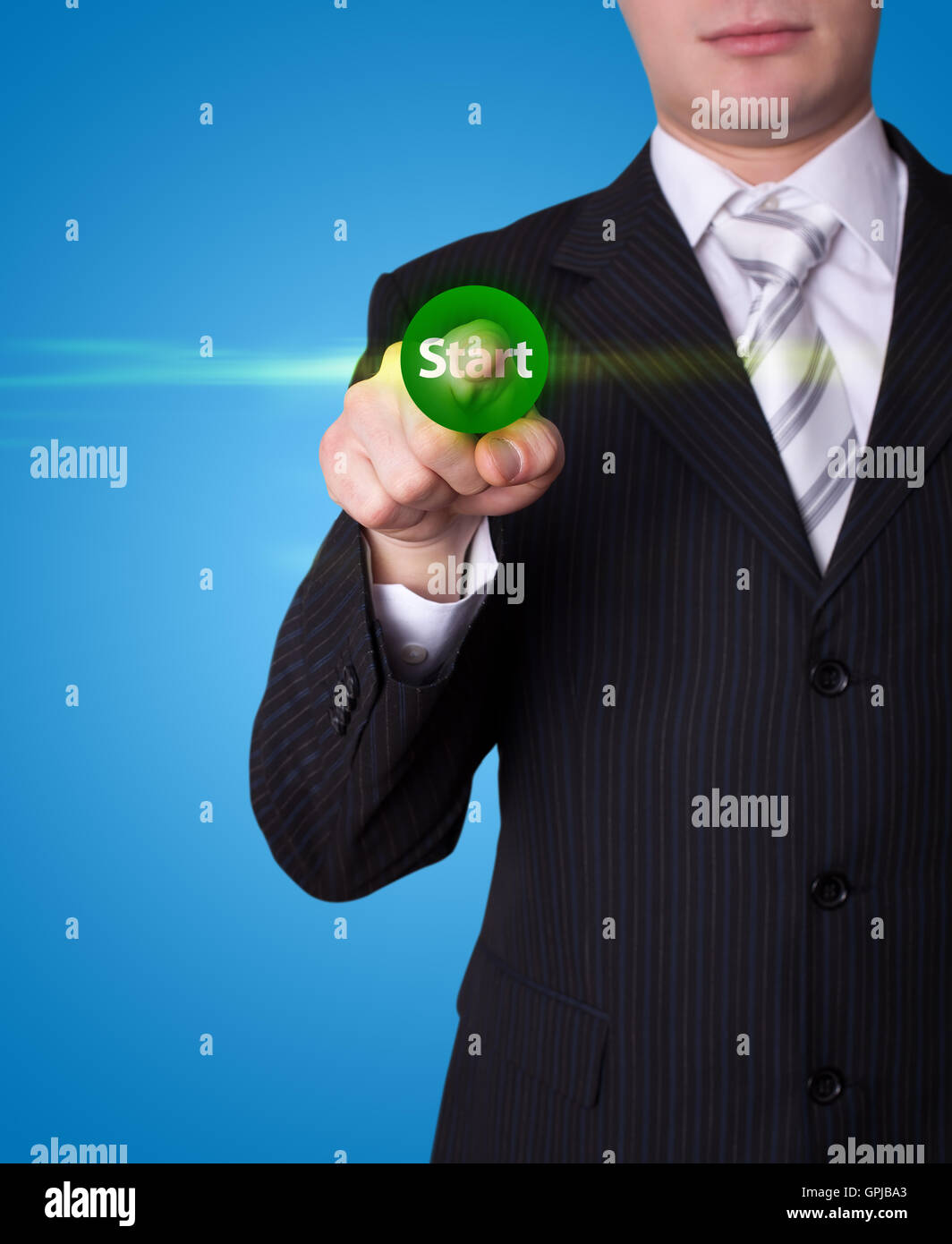 Man pressing Start button Stock Photo - Alamy