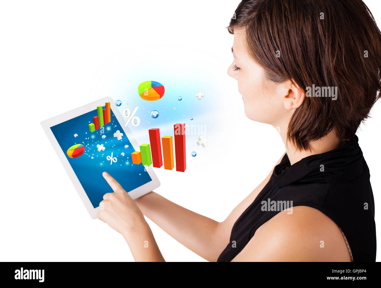 Young woman looking at modern tablet with colourful diagrams Stock ...