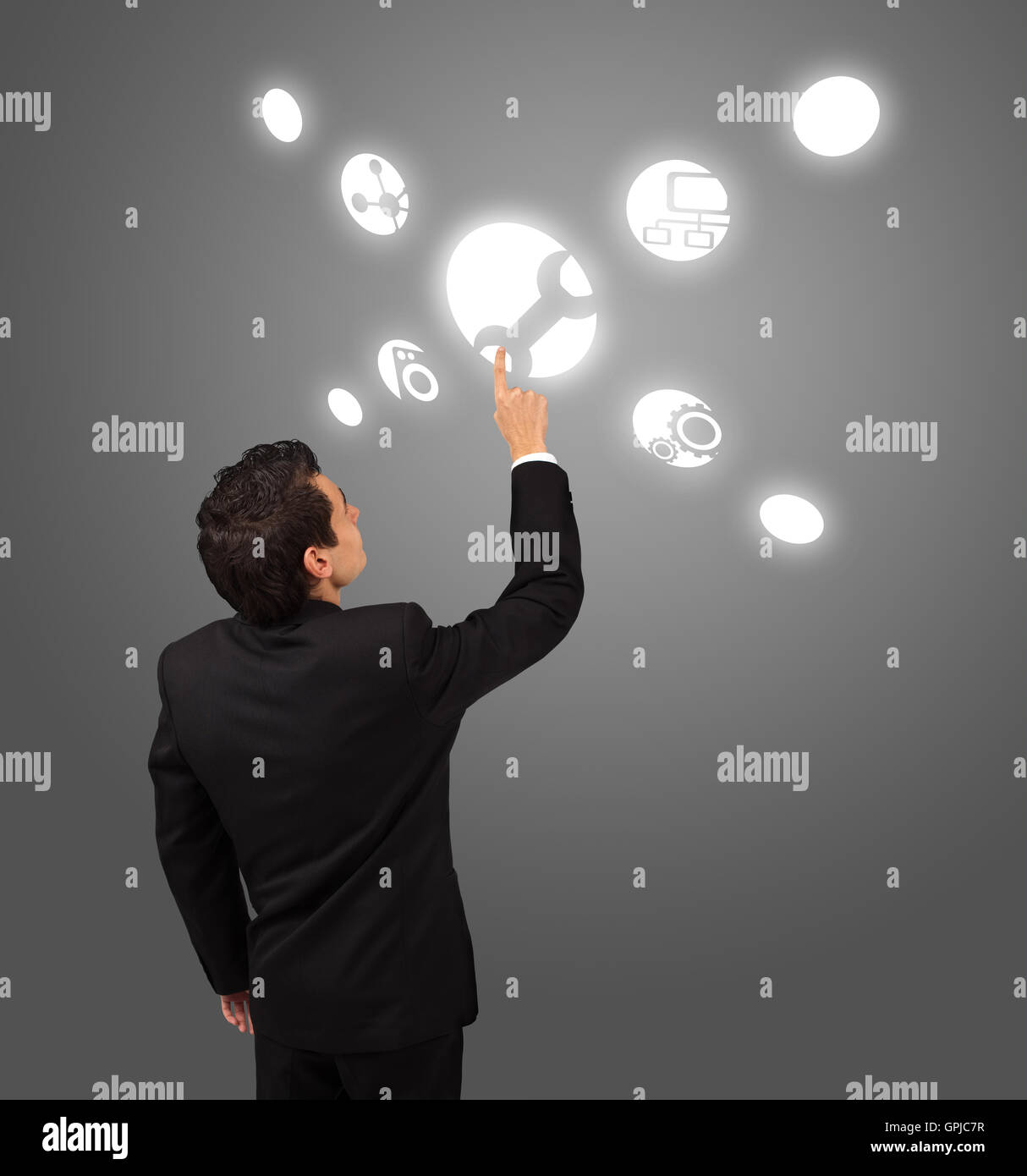 Smart man pressing virtual buttons hi-res stock photography and images ...