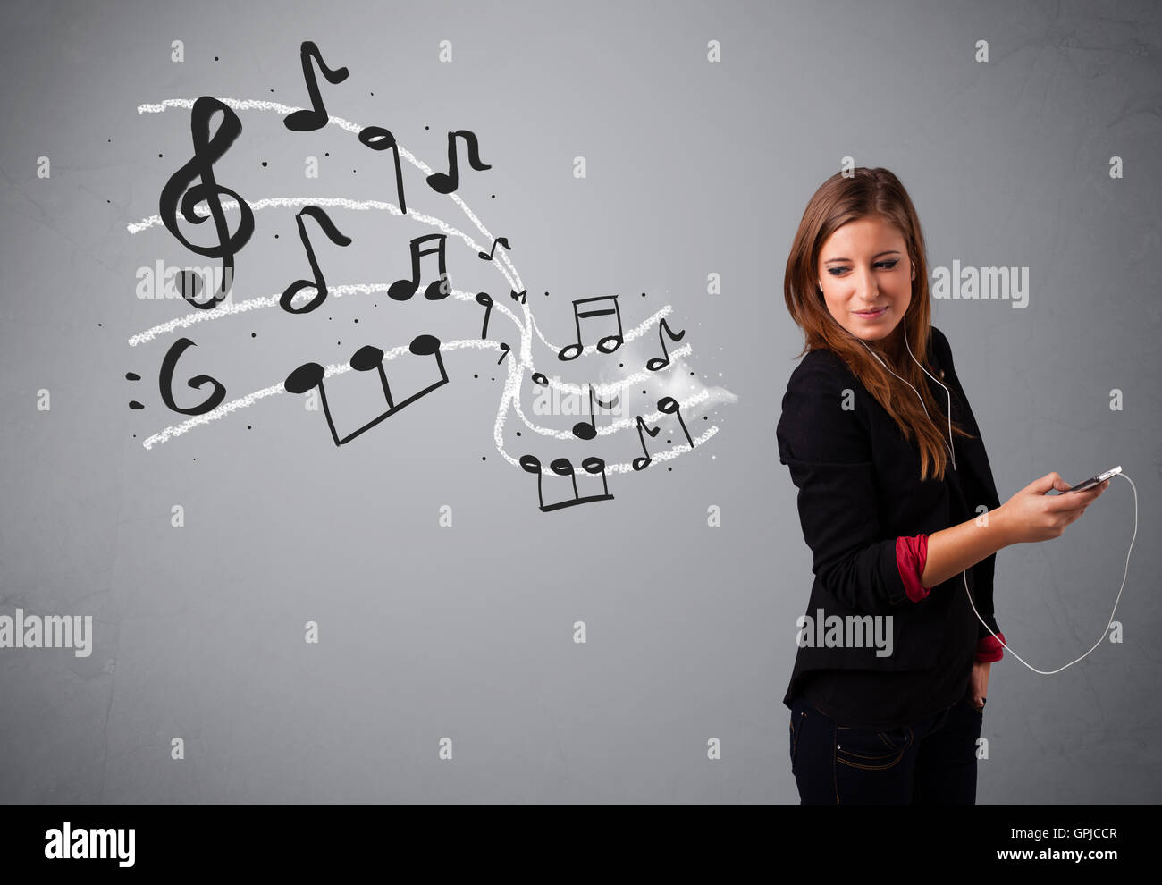 attractive young lady singing and listening to music with musica Stock ...